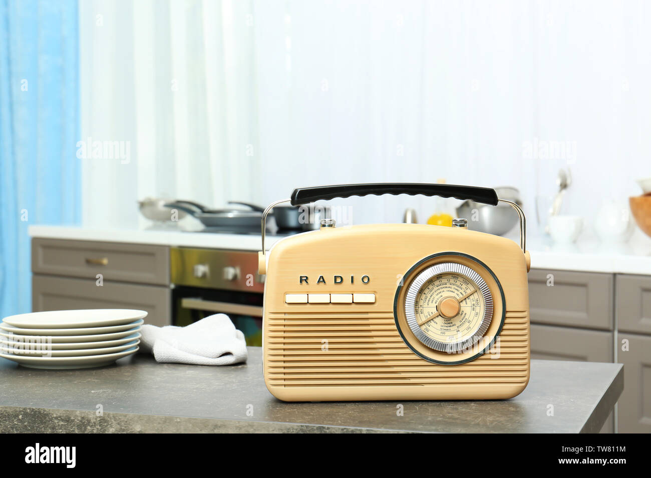 Modern radio on table in kitchen Stock Photo - Alamy