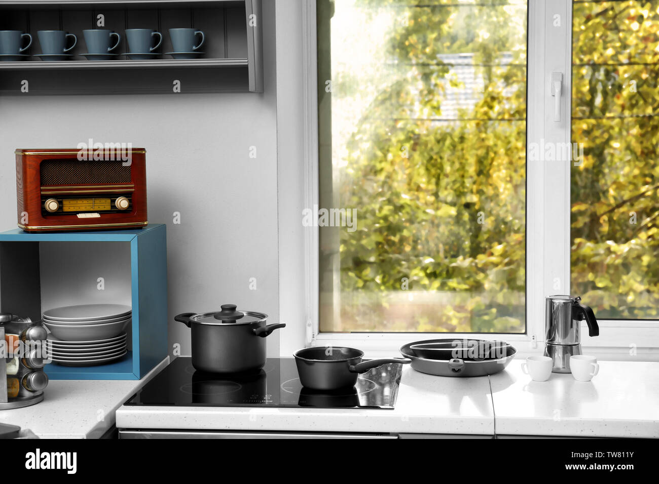 Modern radio on shelf in kitchen Stock Photo - Alamy