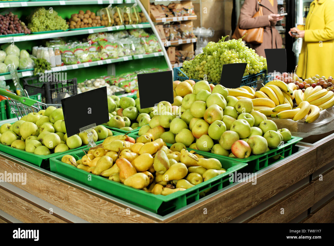 Variety of fresh ripe fruits in supermarket Stock Photo - Alamy