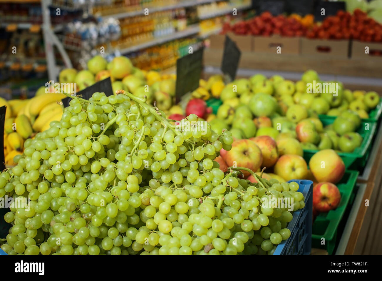 Variety of fresh ripe fruits in supermarket Stock Photo - Alamy