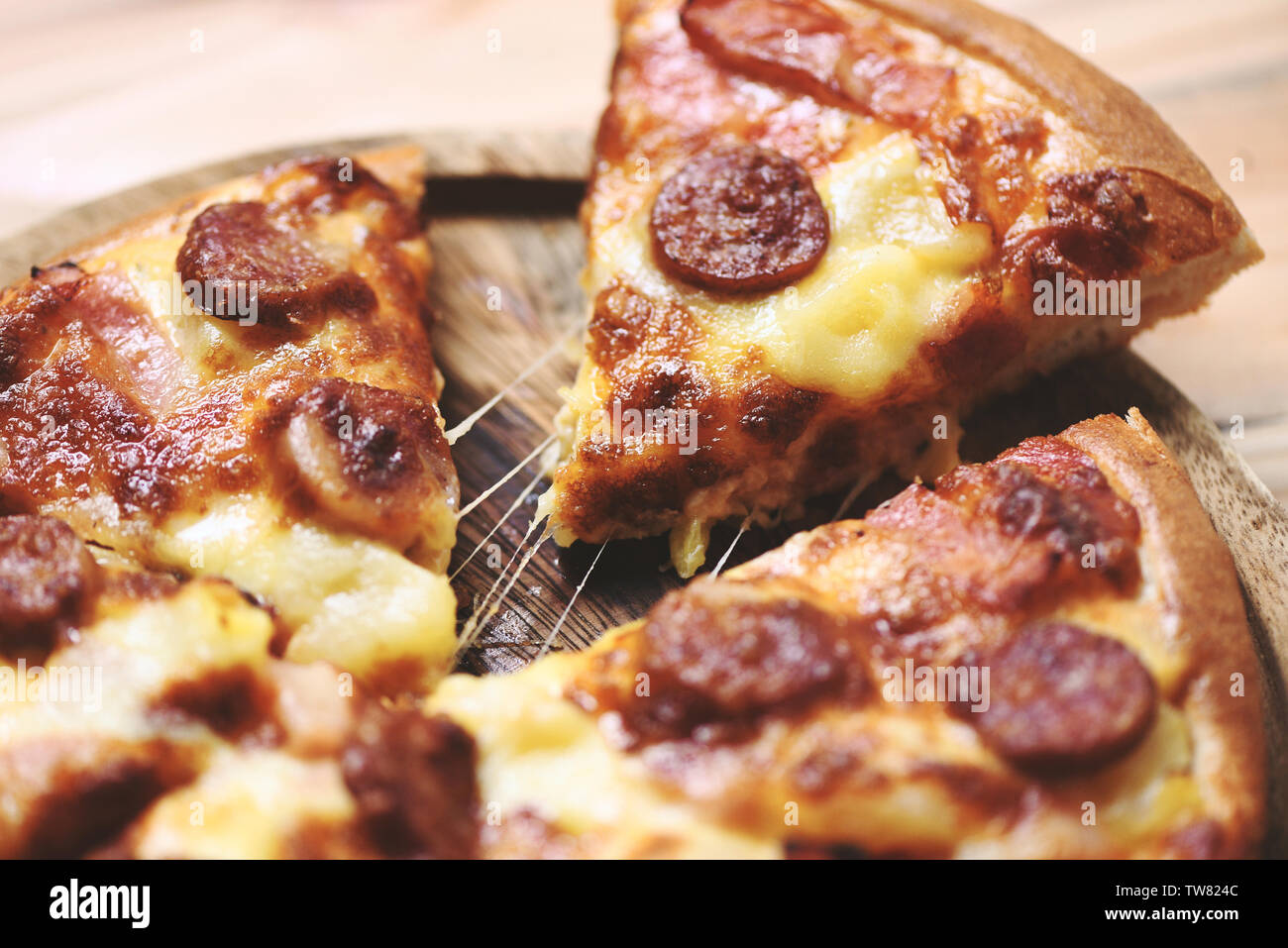 Pizza on wooden tray close up / delicious tasty fast food italian ...