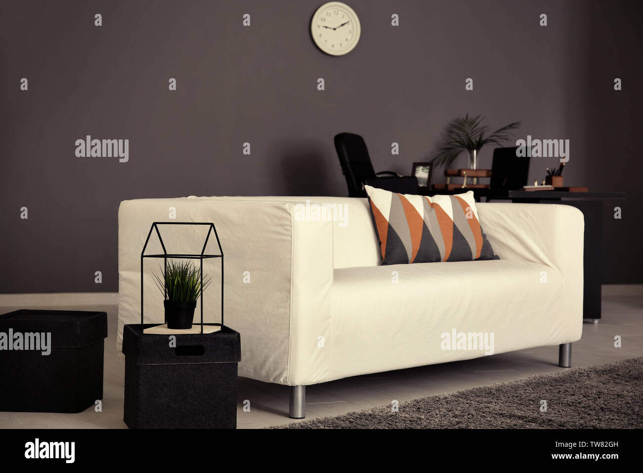 Interior of modern office with comfortable sofa Stock Photo - Alamy