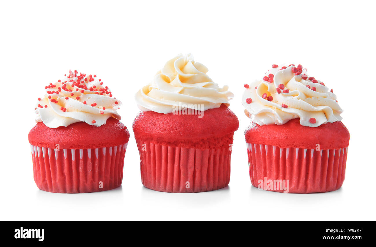 Delicious red velvet cupcakes on white background Stock Photo - Alamy