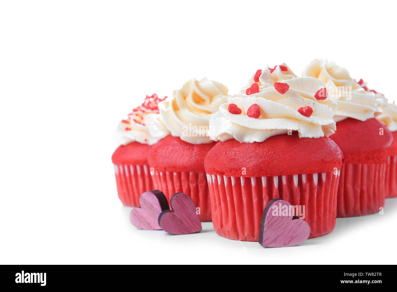 Delicious red velvet cupcakes on white background Stock Photo - Alamy
