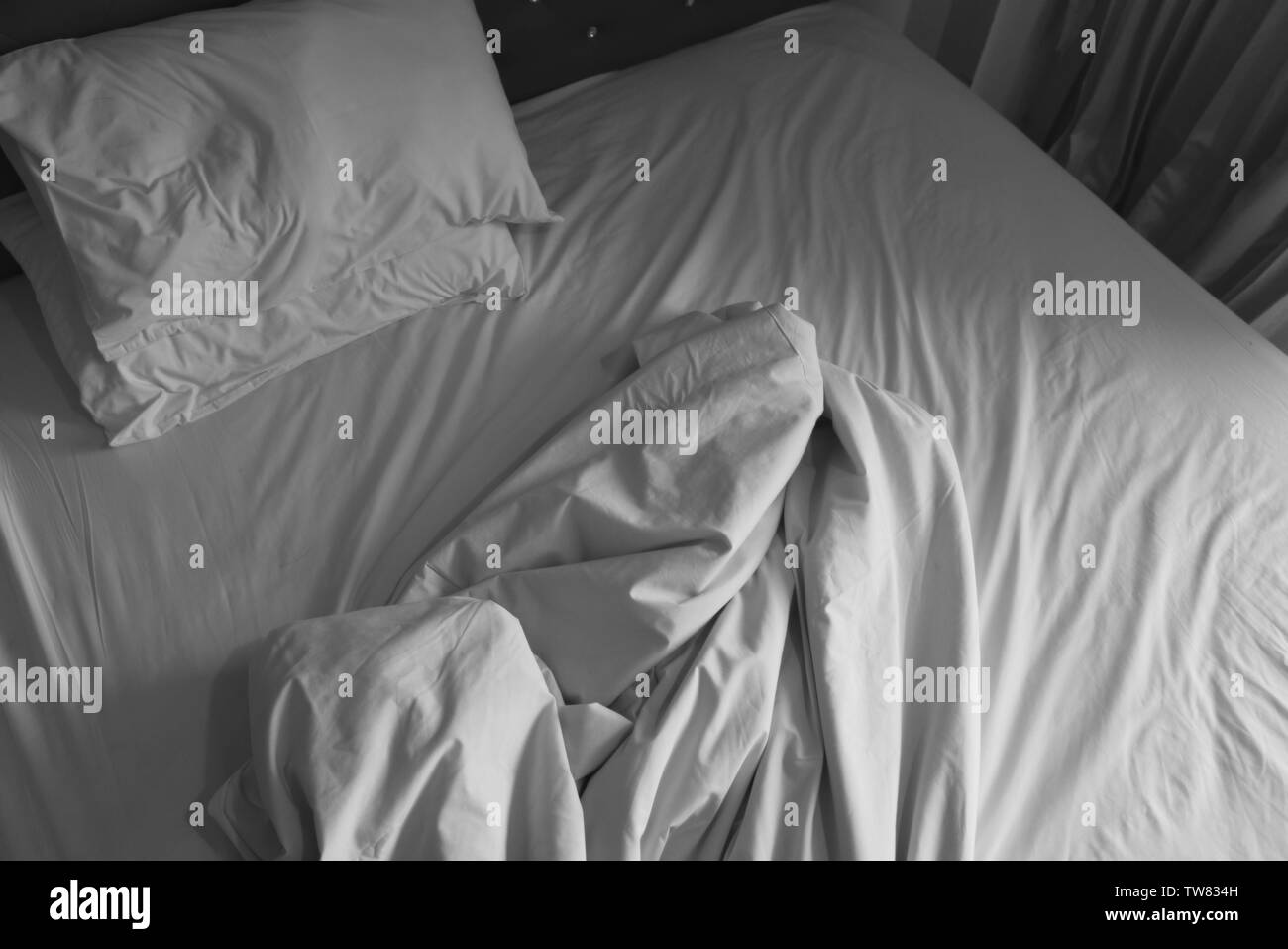 Empty unmade bed crumpled Black and White Stock Photos & Images - Alamy