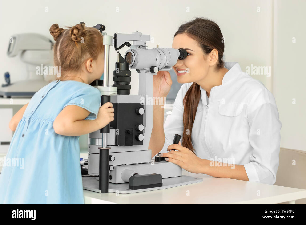Cute little child at ophthalmologist's office Stock Photo - Alamy