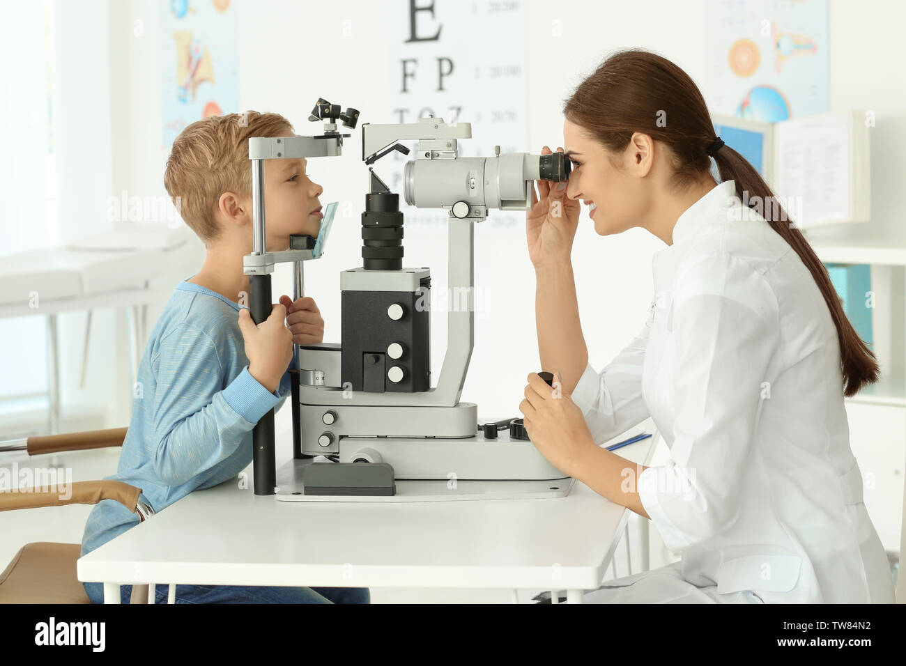 Cute little child at ophthalmologist's office Stock Photo - Alamy