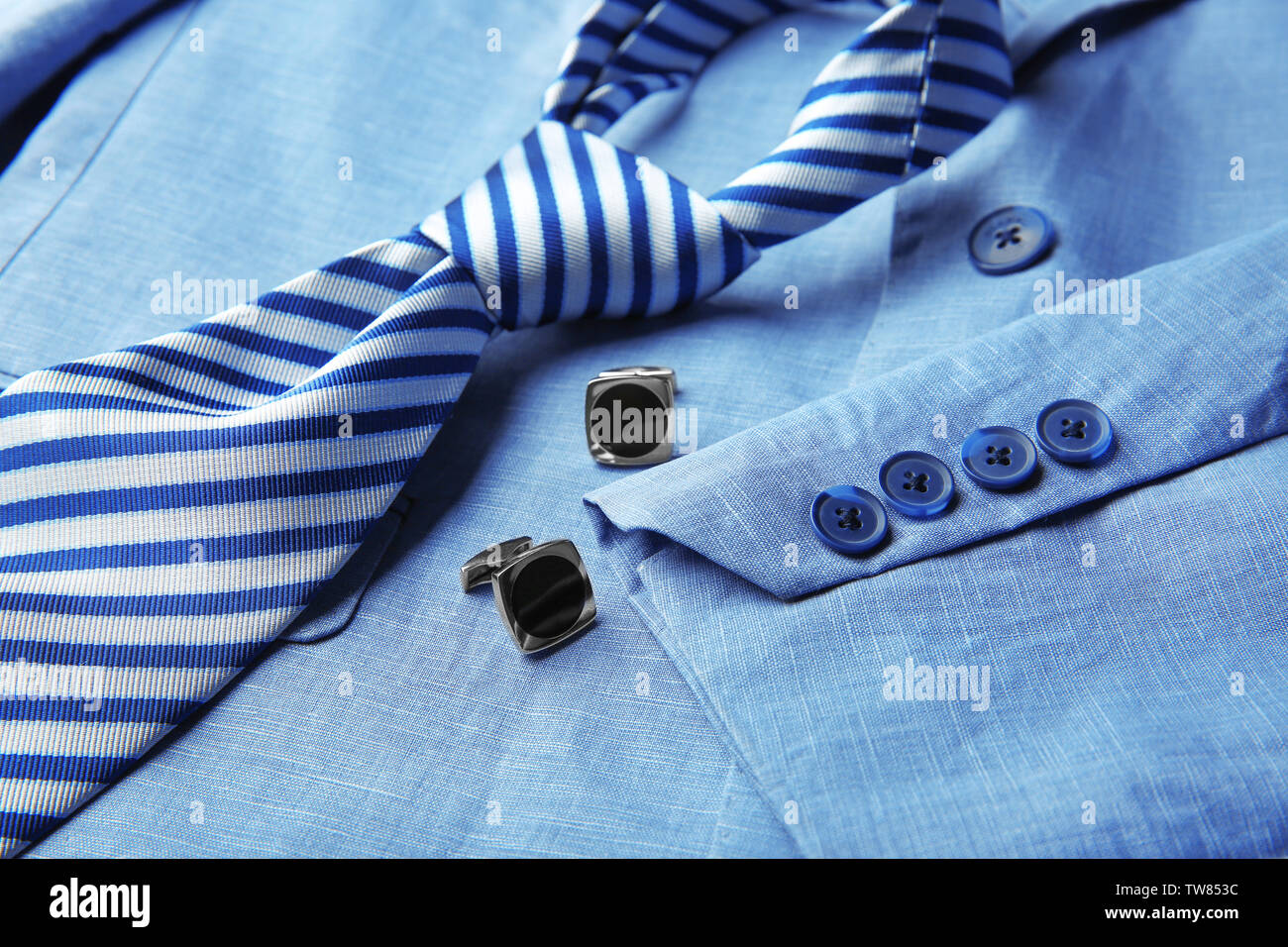 Elegant tie and cuff links on male jacket, closeup Stock Photo - Alamy