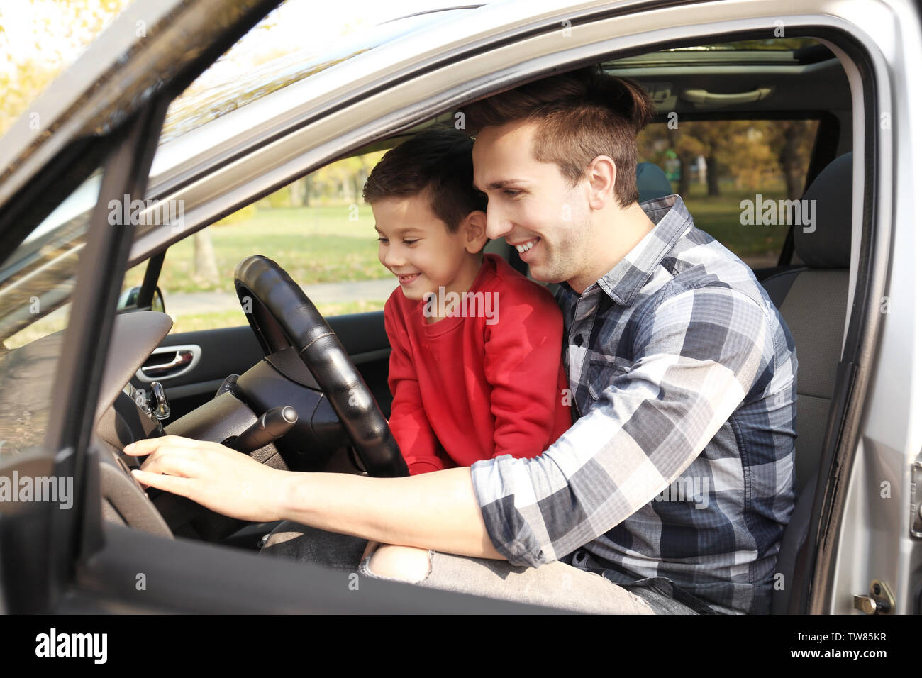 Father teach son drive hi-res stock photography and images - Alamy