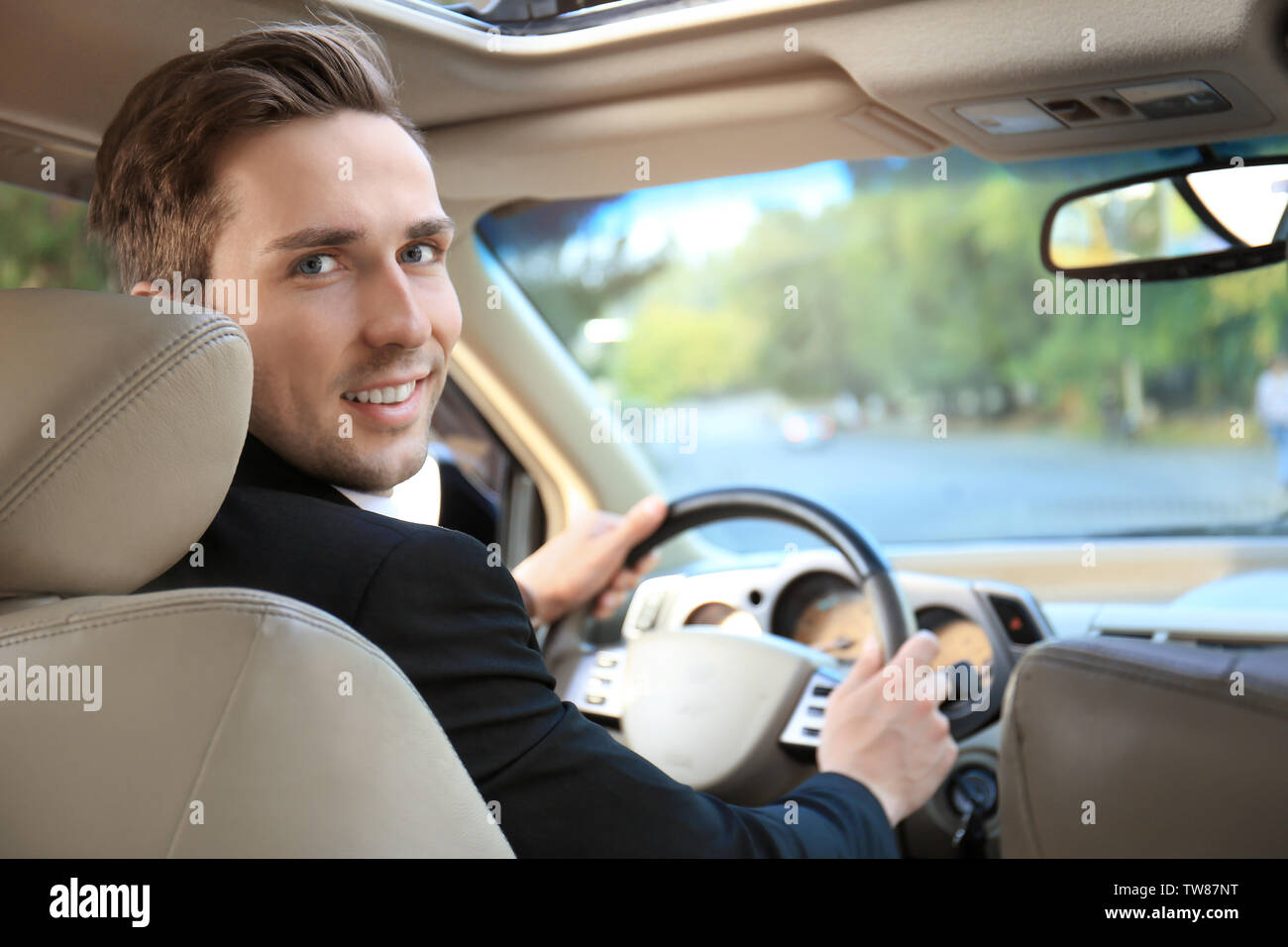 Portrait man sitting drivers seat hi-res stock photography and images ...