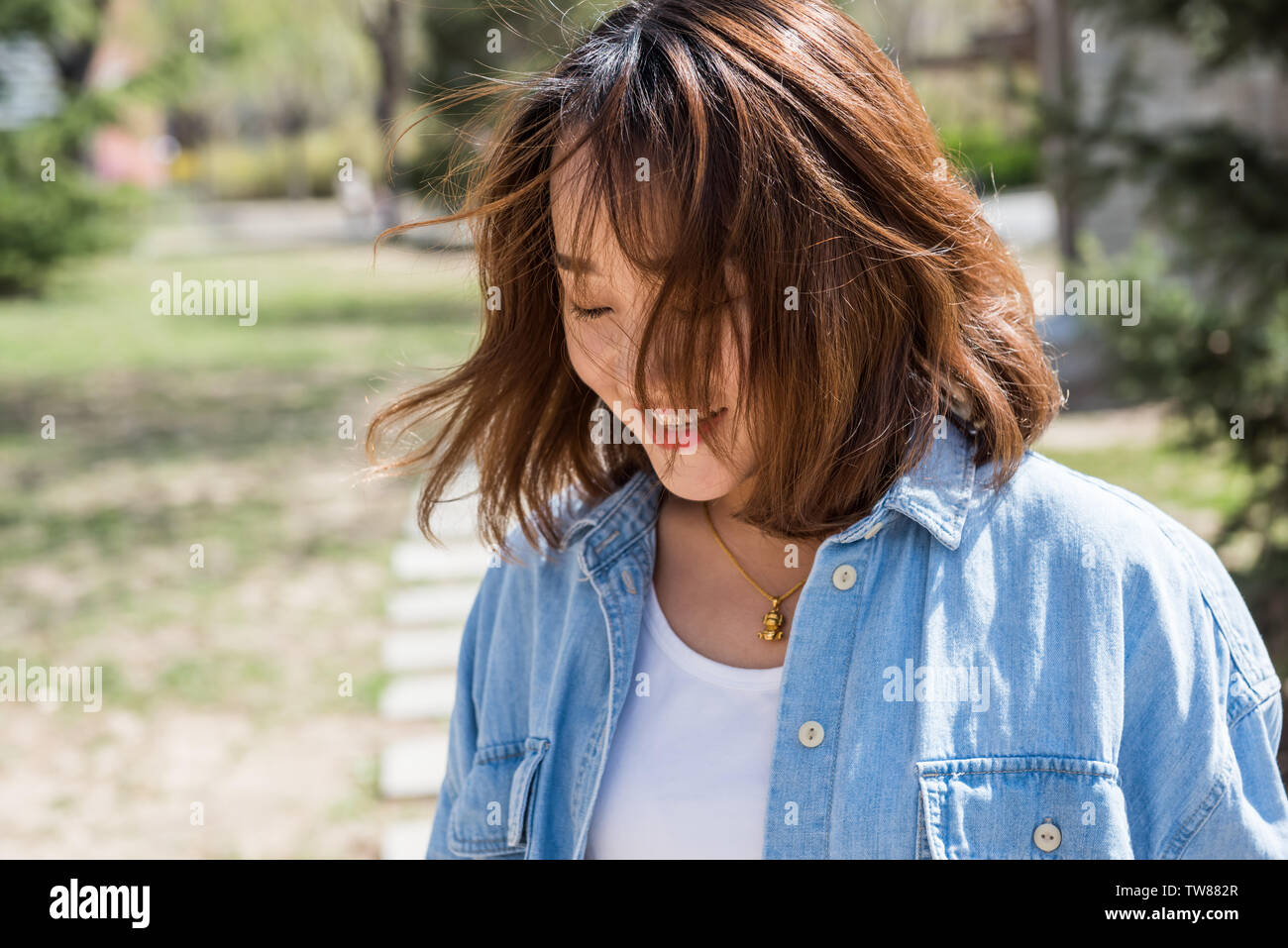 Beautiful female college student on campus Stock Photo - Alamy