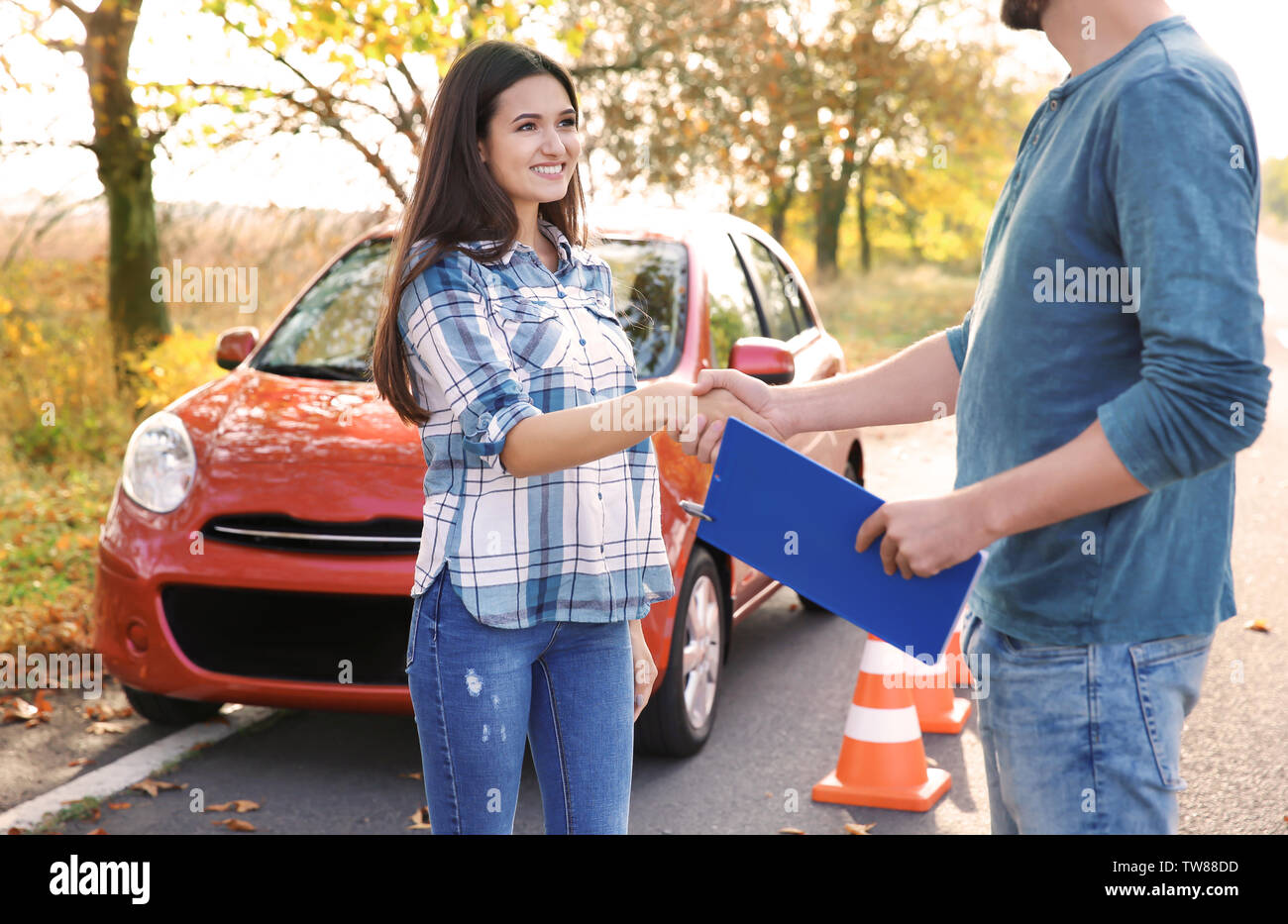 Young woman passed driving license exam Stock Photo - Alamy
