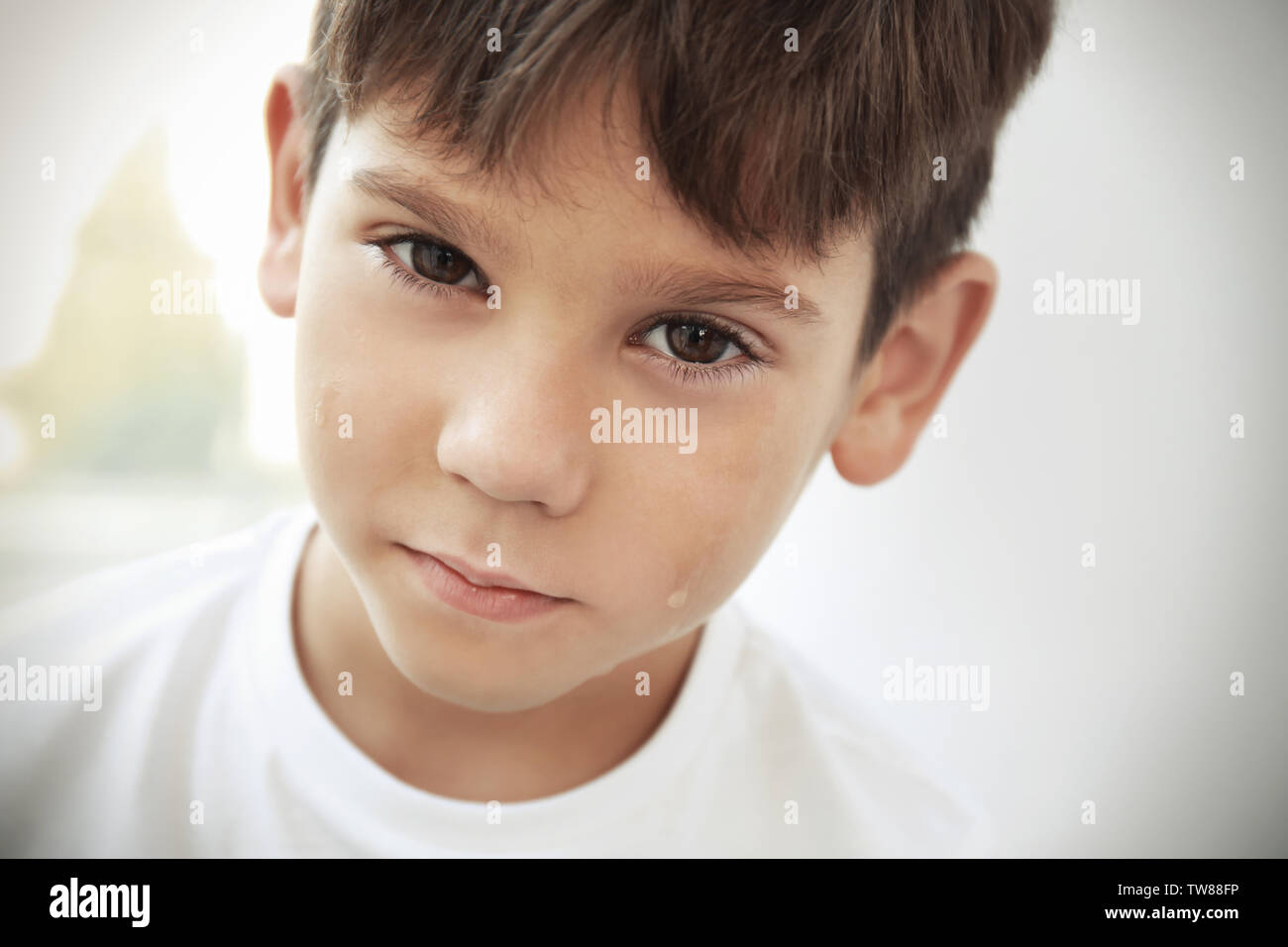 Sad boy crying hi-res stock photography and images - Alamy