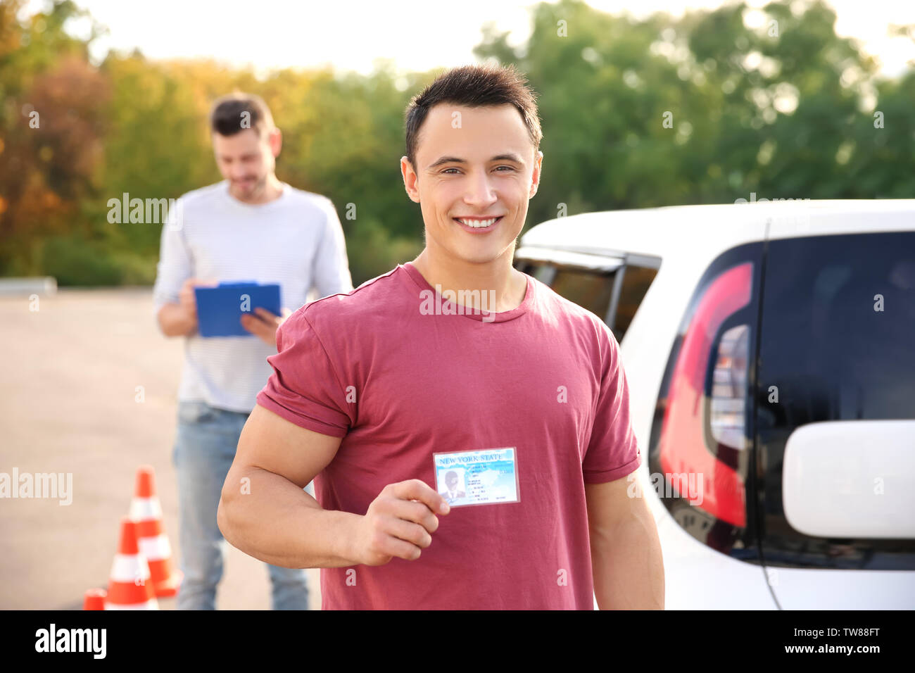 Man holding driving license hi-res stock photography and images - Alamy