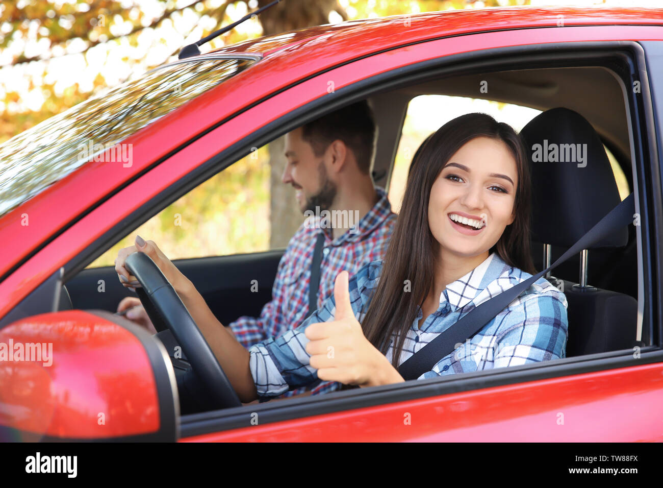 Young woman passing driving license exam Stock Photo - Alamy