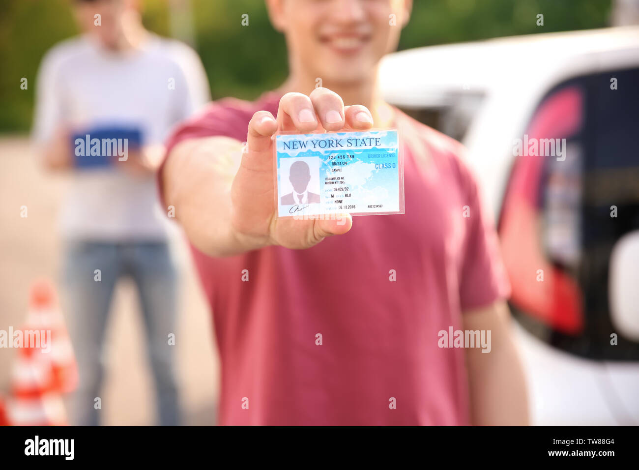 Man holding driving license hi-res stock photography and images - Alamy