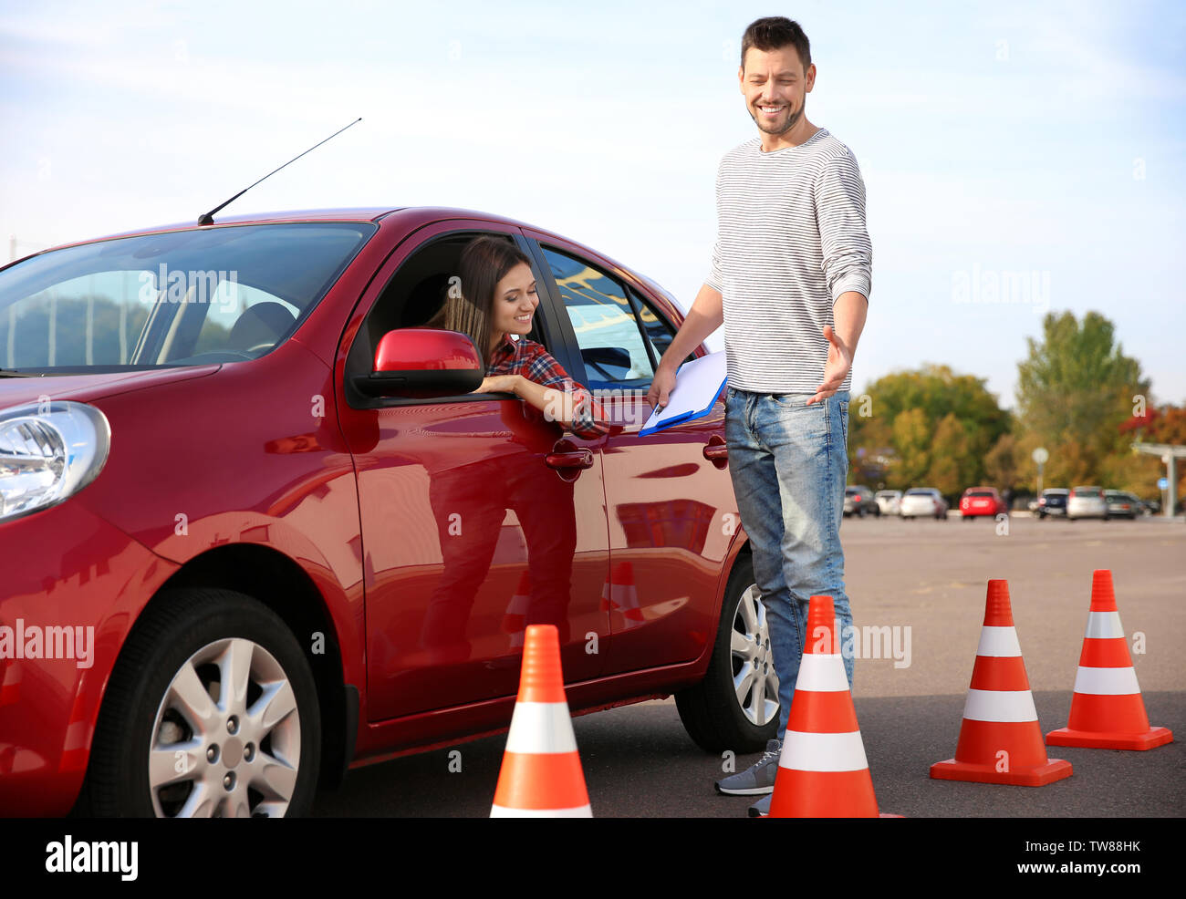 Young woman passing driving license exam Stock Photo - Alamy