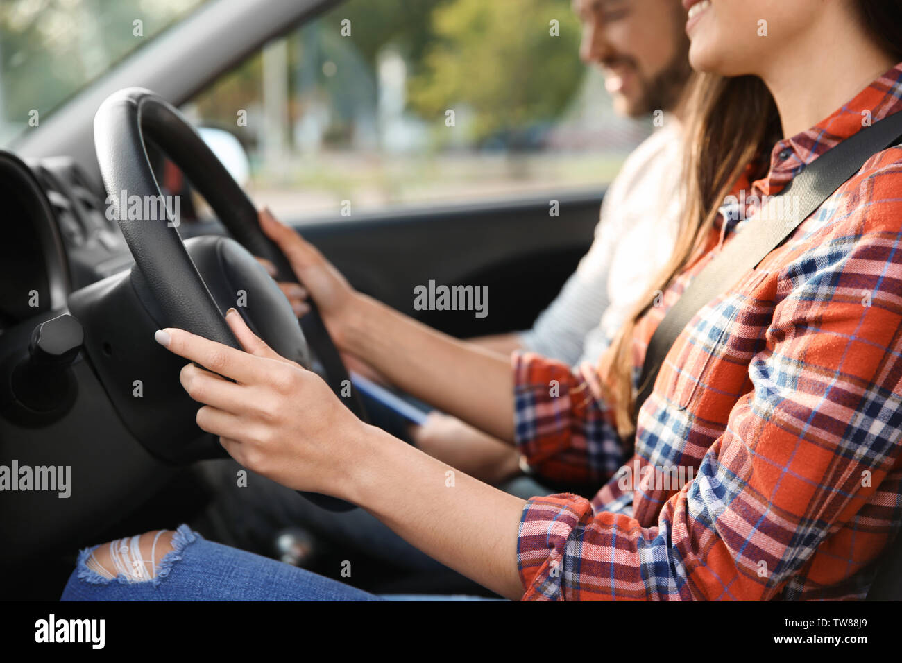Young woman passing driving license exam Stock Photo - Alamy