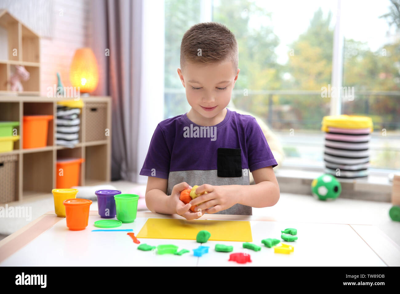 Kindergarten playdough activity hi-res stock photography and images - Alamy