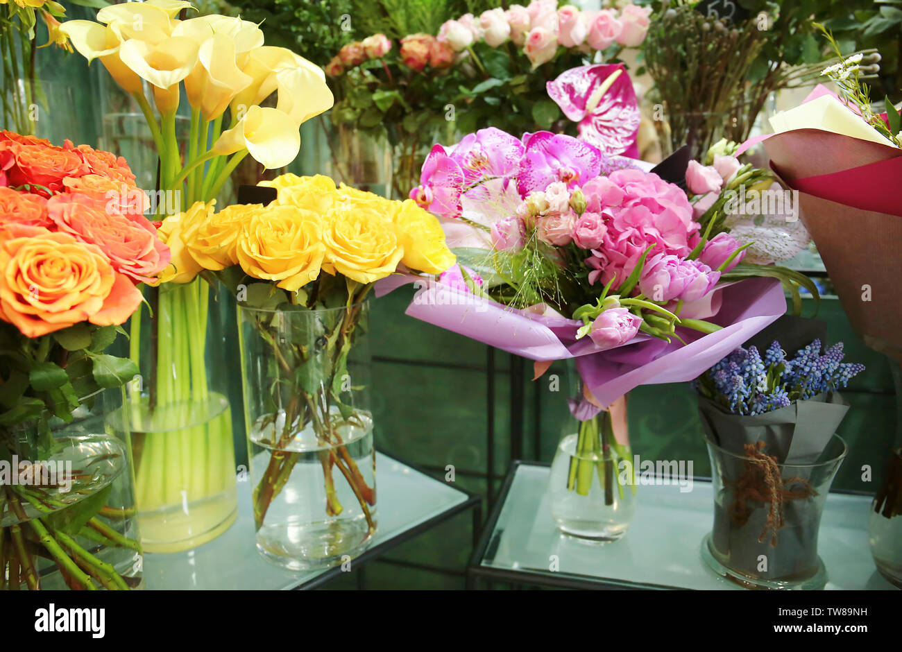 Assortment of beautiful flowers in shop Stock Photo - Alamy