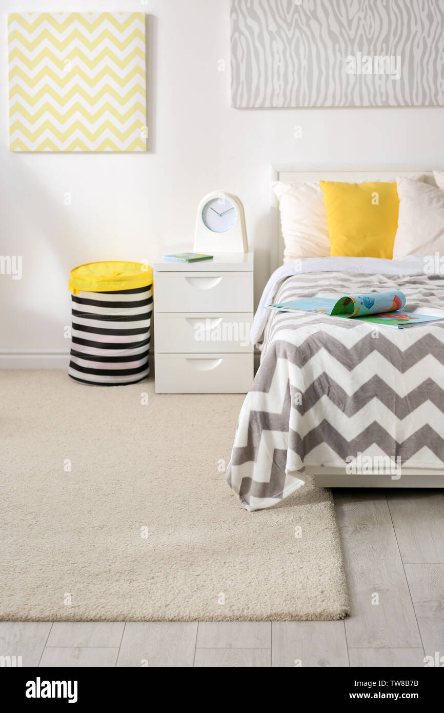 Modern bedroom interior with soft carpet Stock Photo - Alamy