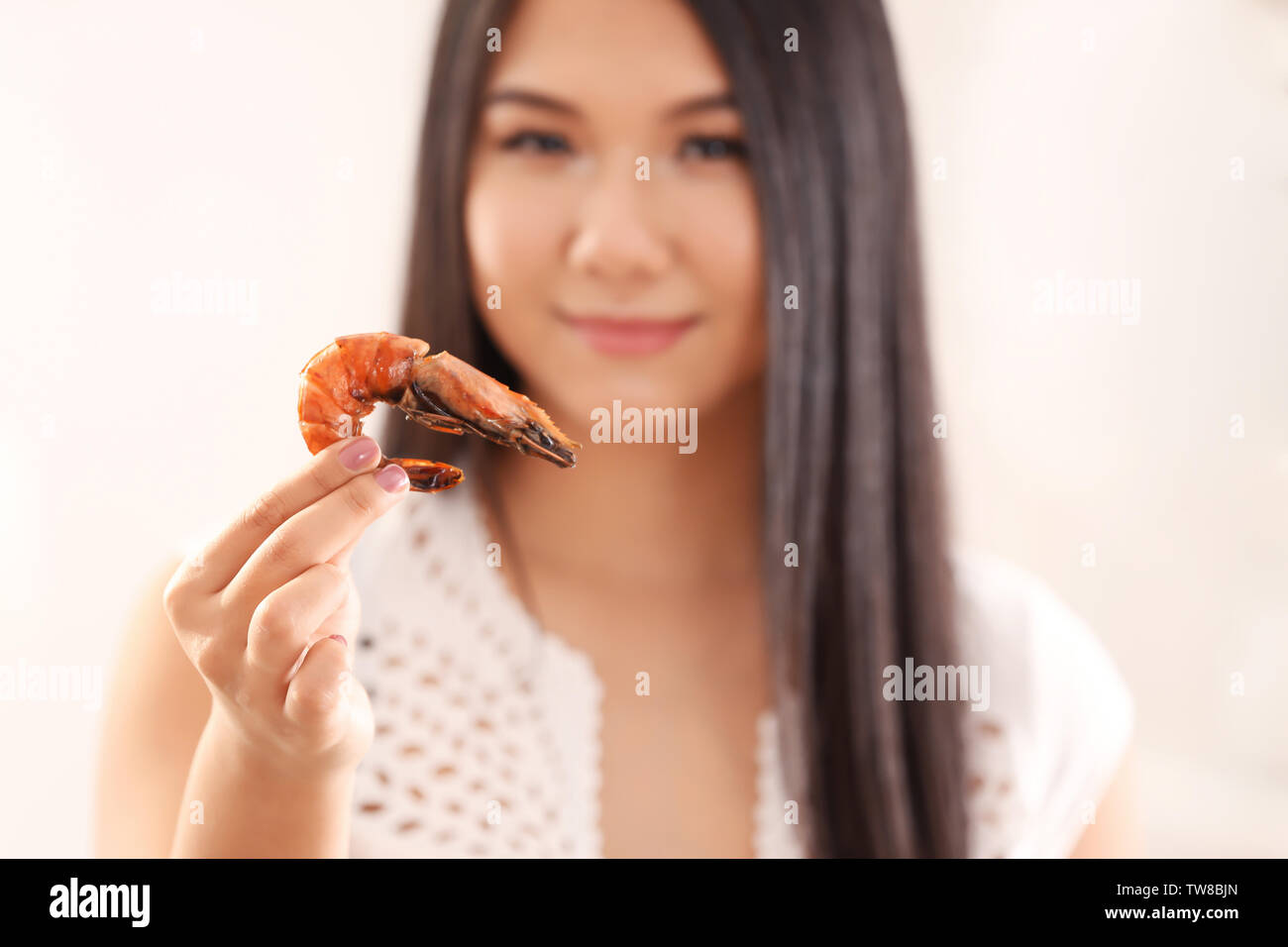 Holding shrimp hi-res stock photography and images - Alamy