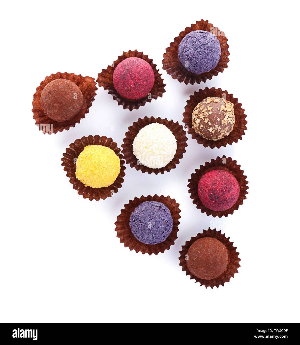 Assorted chocolate truffles on white background Stock Photo - Alamy