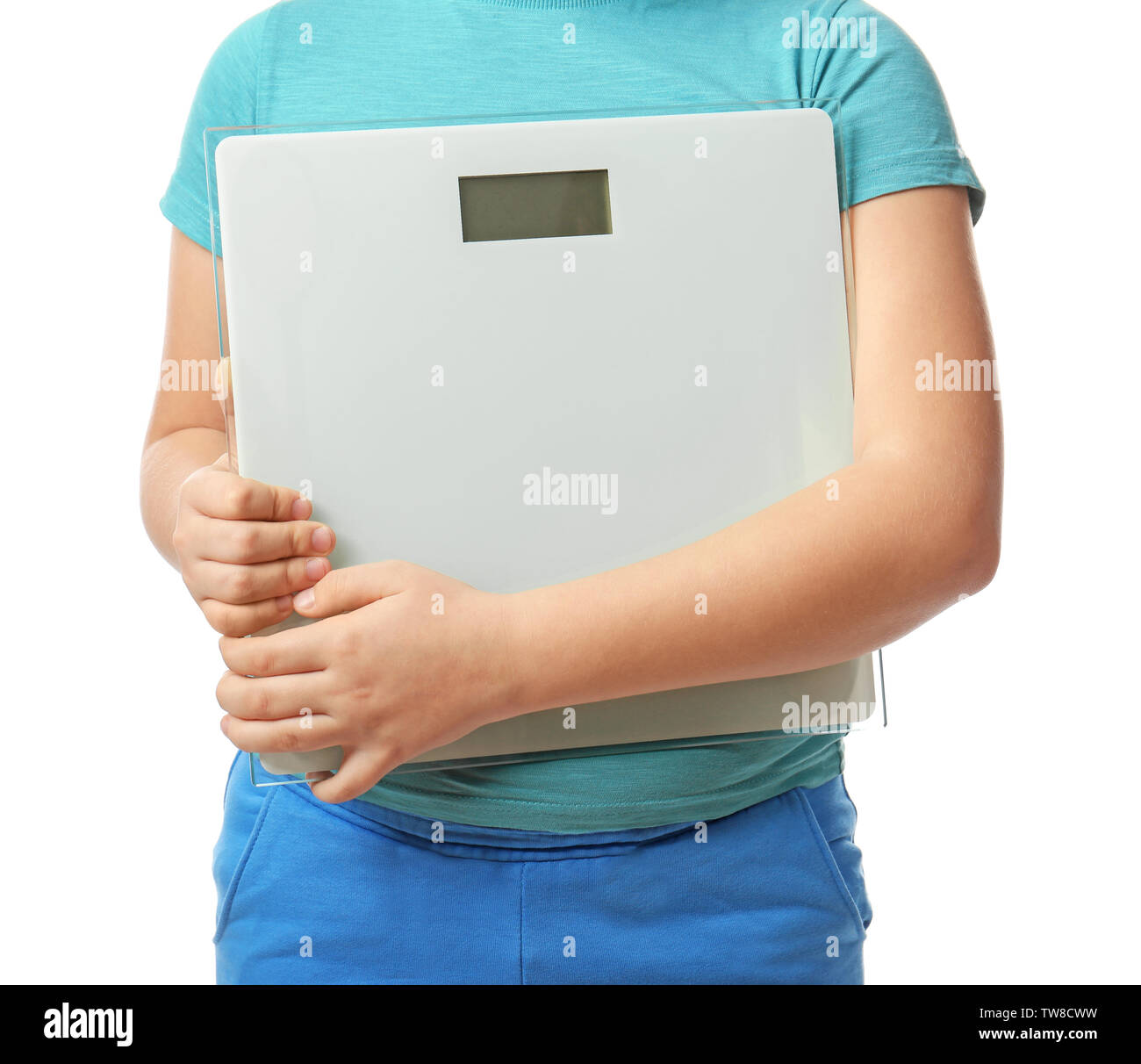 Overweight boy with scales on white background, closeup Stock Photo - Alamy