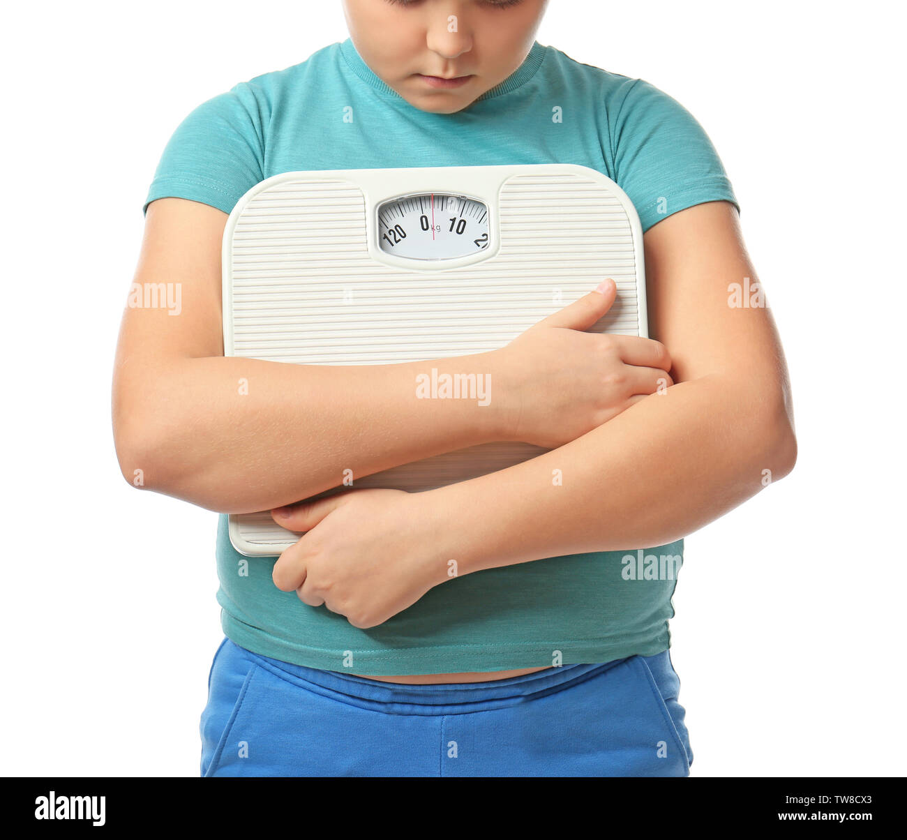 Child obese scales hi-res stock photography and images - Alamy