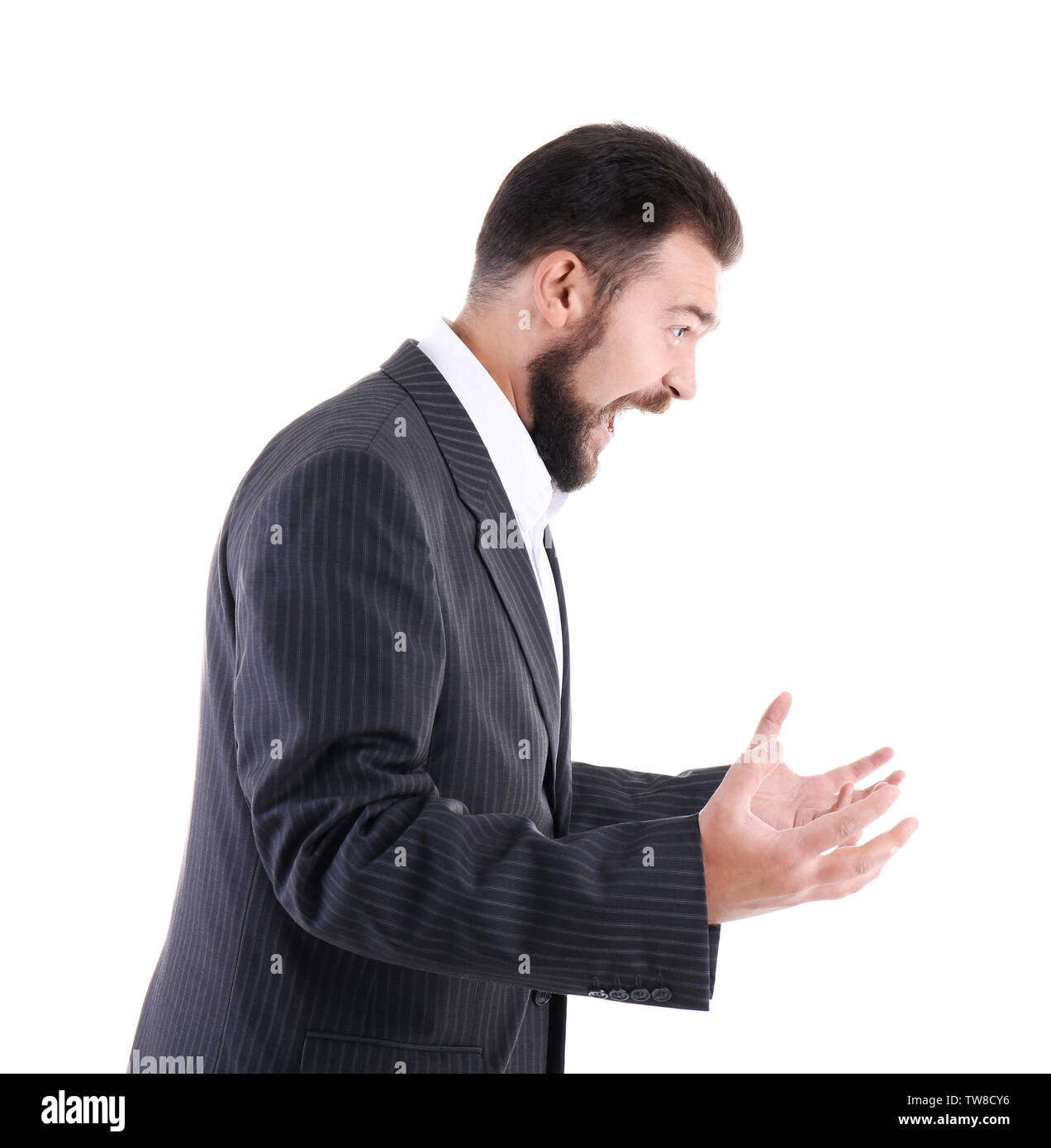Portrait of angry man in suit on white background Stock Photo - Alamy