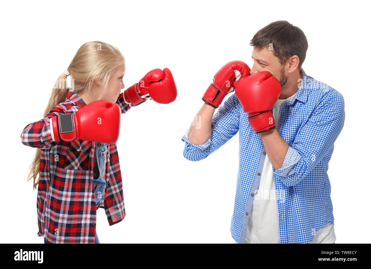 Cute little girl and her father boxing on white background Stock Photo ...