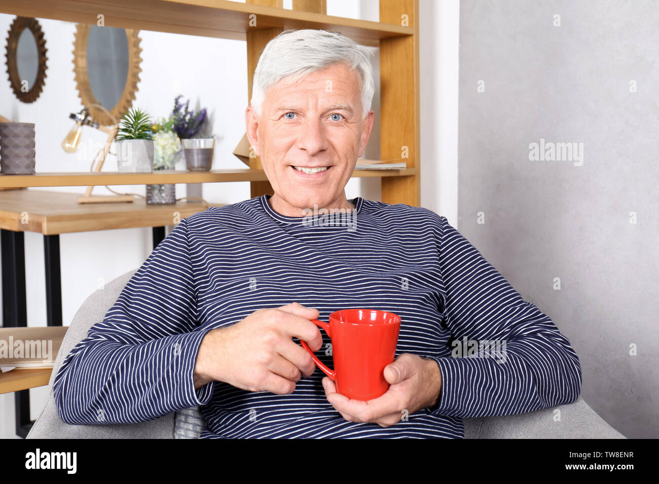 Mature man drinking tea hi-res stock photography and images - Alamy