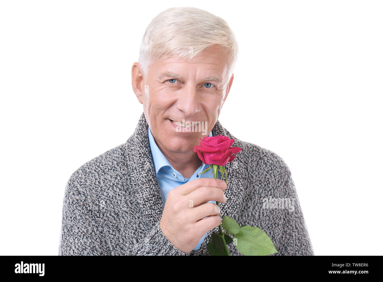 Mature gentleman holding rose flower hi-res stock photography and ...