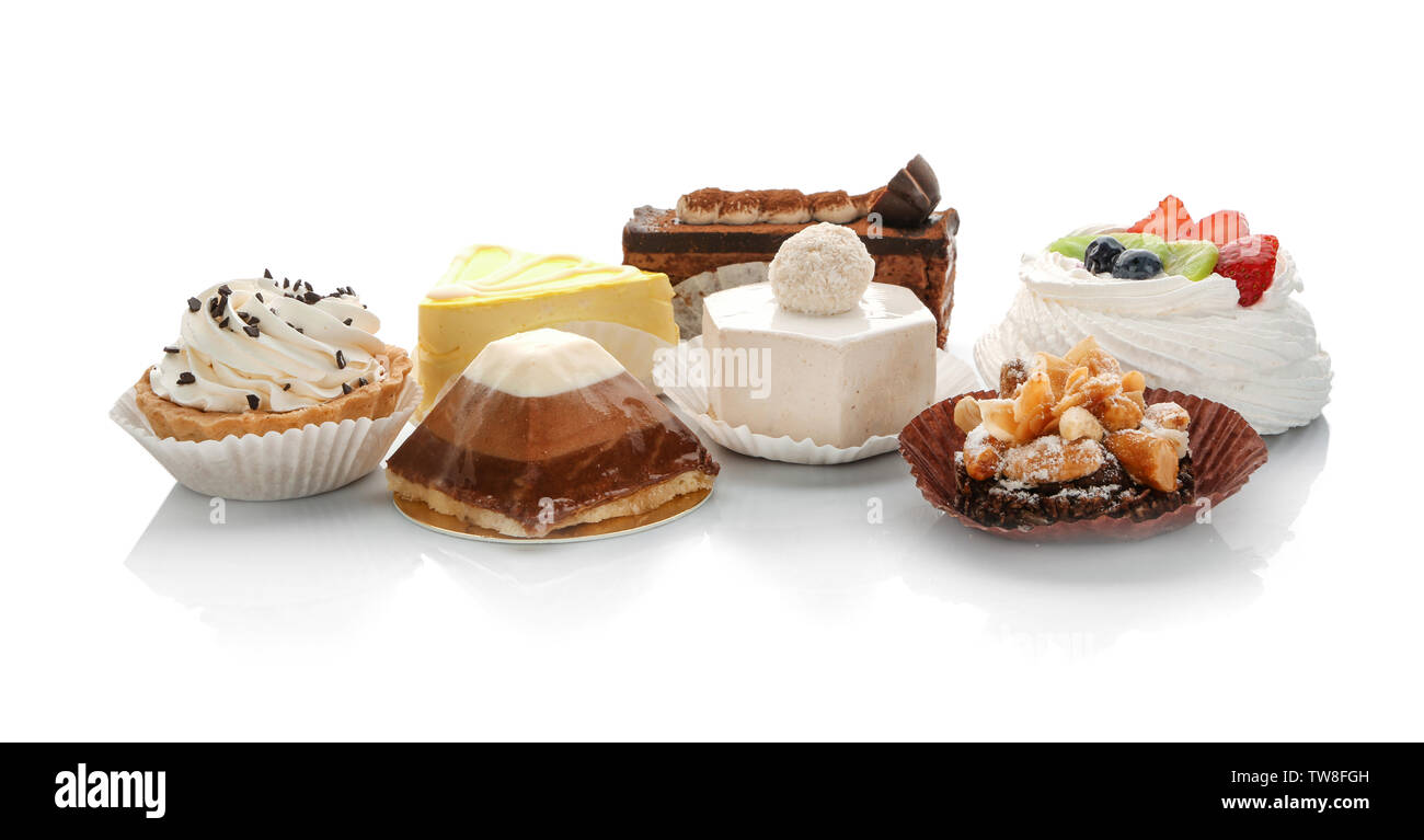 Assortment of tasty pastries on white background Stock Photo - Alamy
