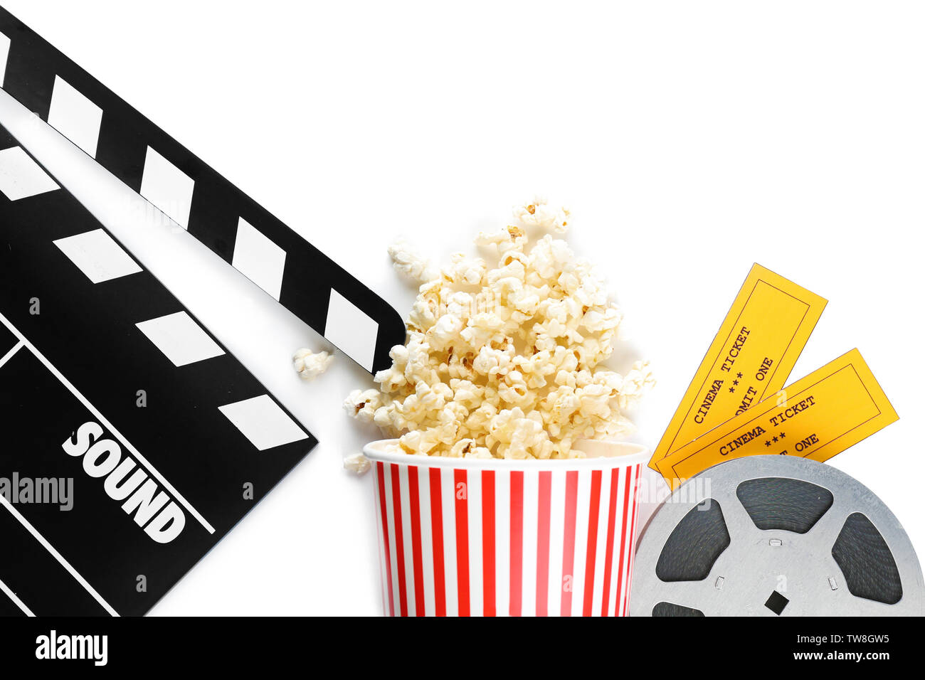 Composition with popcorn, movie clapper and cinema tickets on white ...