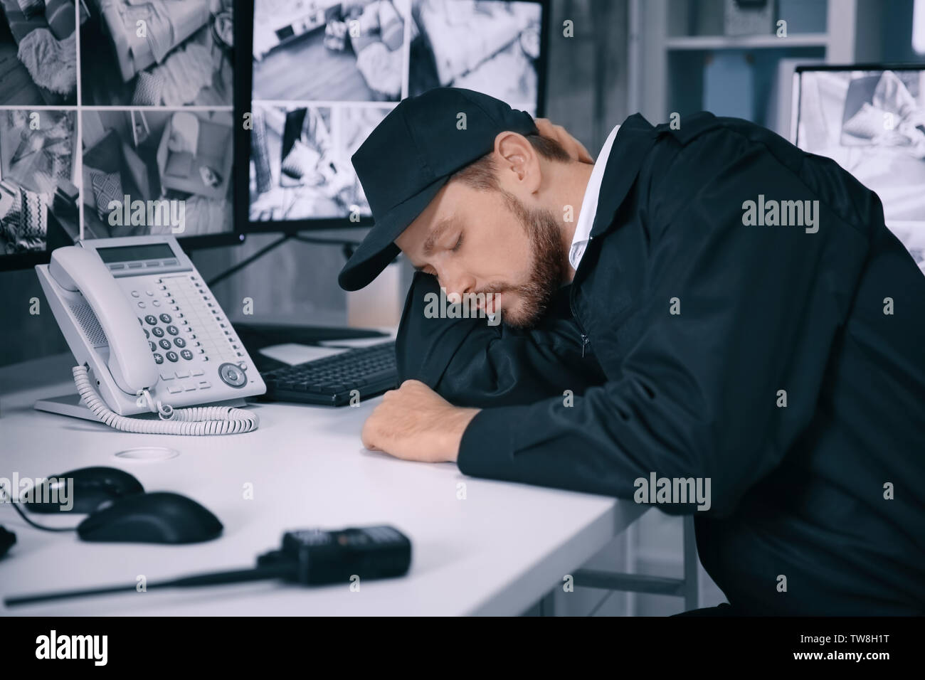 Sleeping security guard hi-res stock photography and images - Alamy