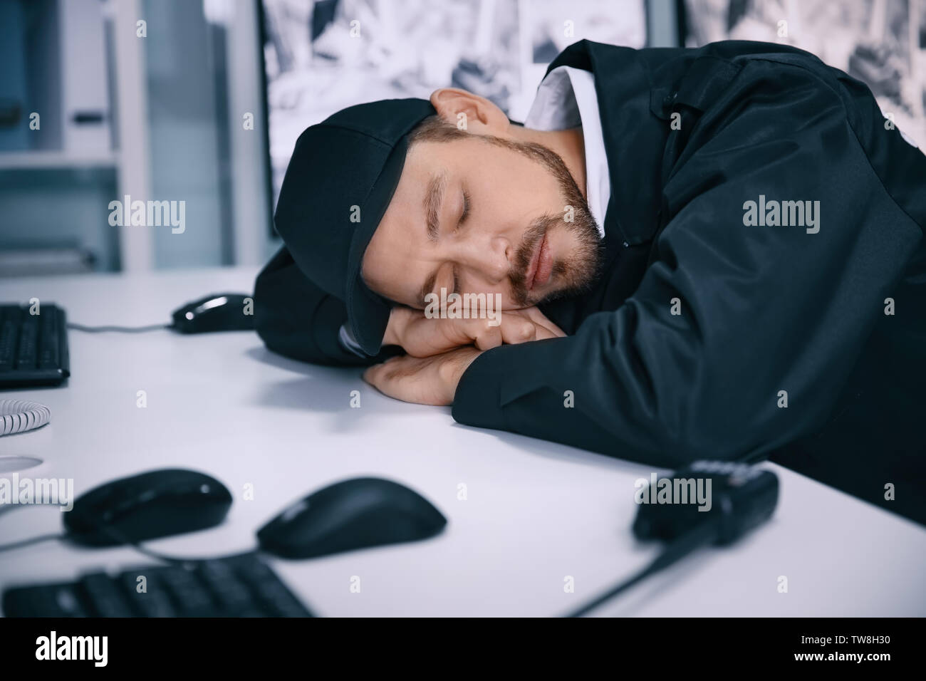 Sleeping security guard hi-res stock photography and images - Alamy