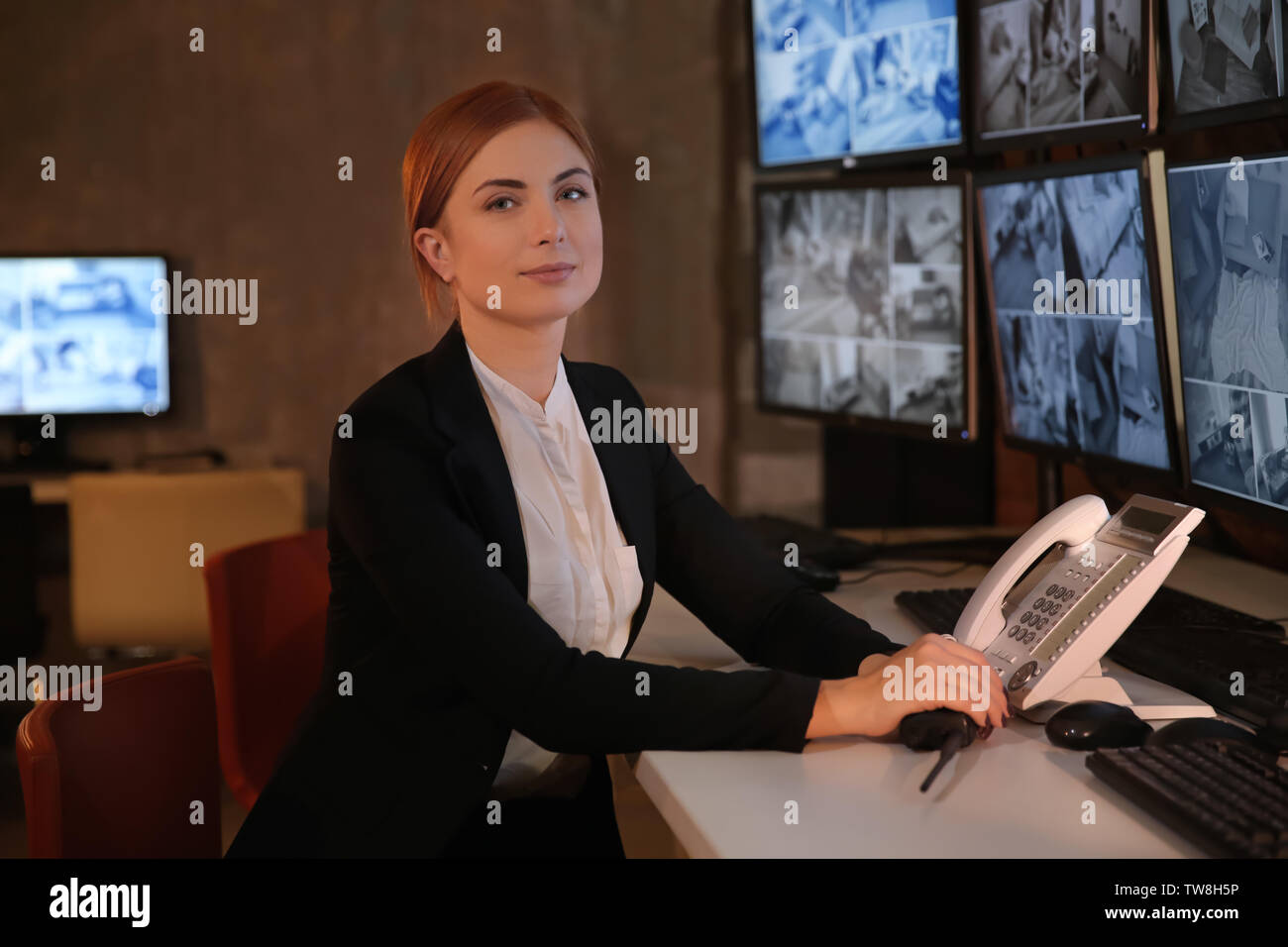Female security guard night hi-res stock photography and images - Alamy