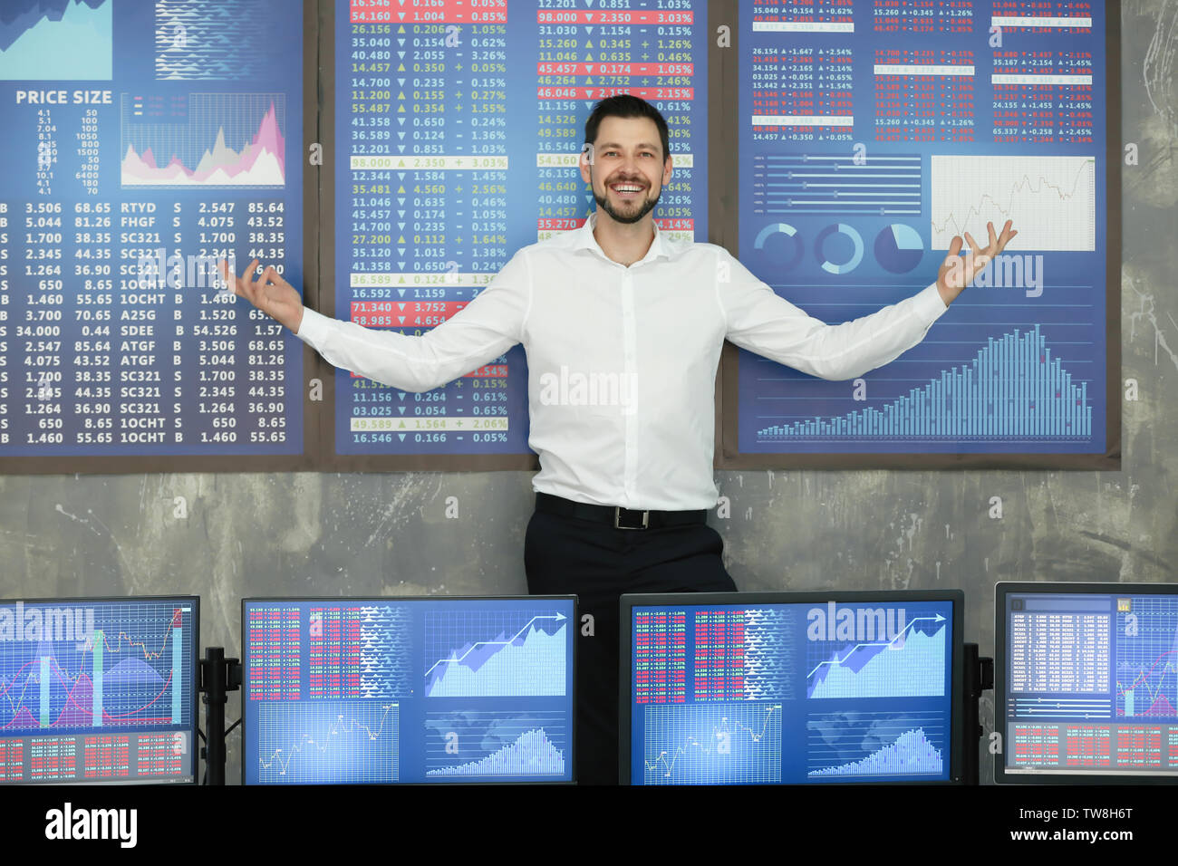 Successful male stock trader in modern office Stock Photo - Alamy
