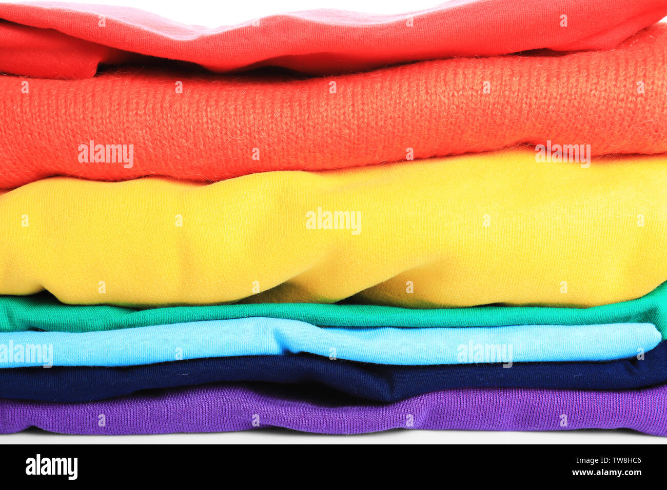 Folded rainbow clothes, close up Stock Photo - Alamy