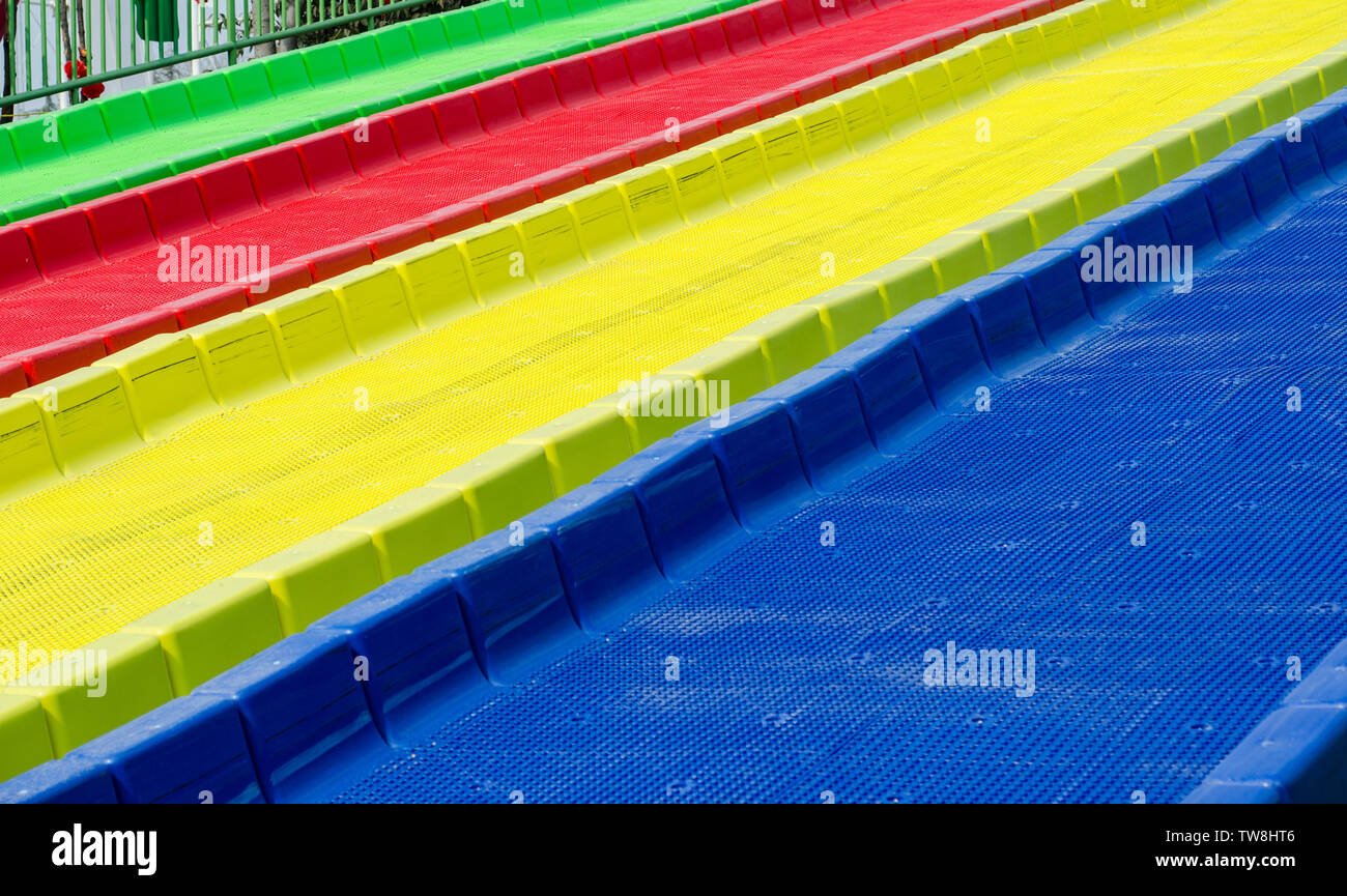 Playground green, red, yellow and blue composition of a set of long ...