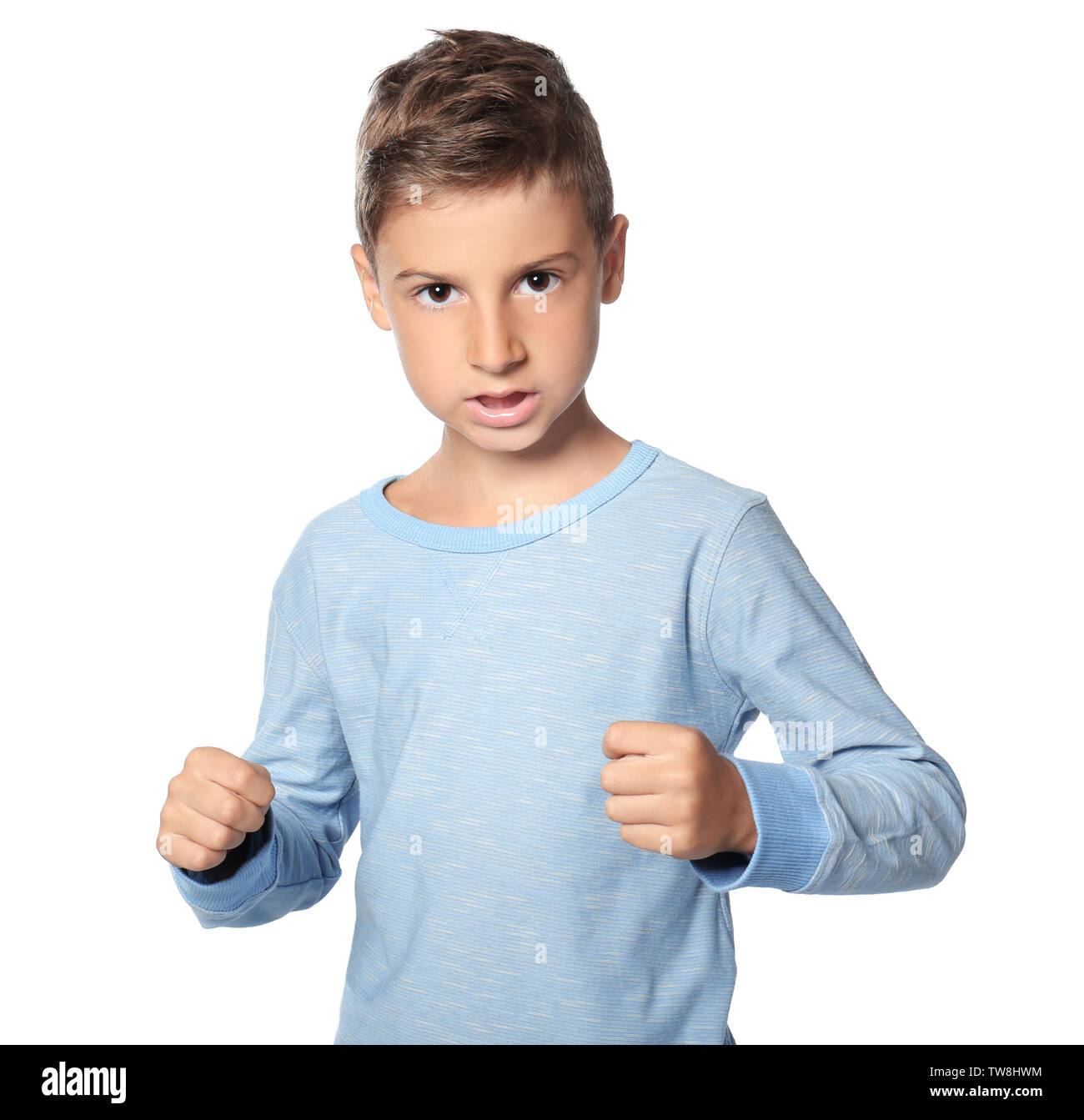 Aggressive little boy on white background Stock Photo - Alamy