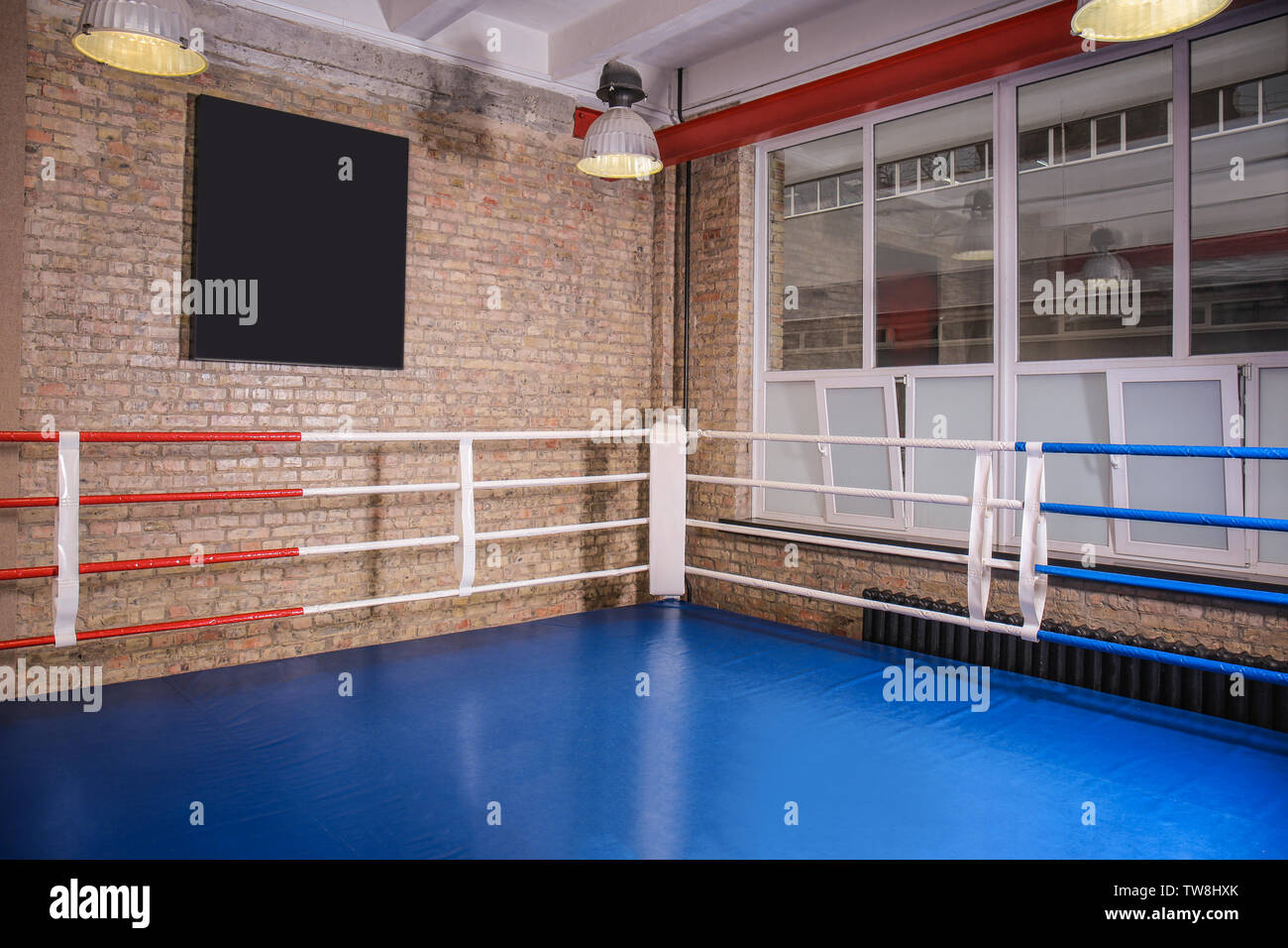 View of empty boxing ring in gym Stock Photo - Alamy