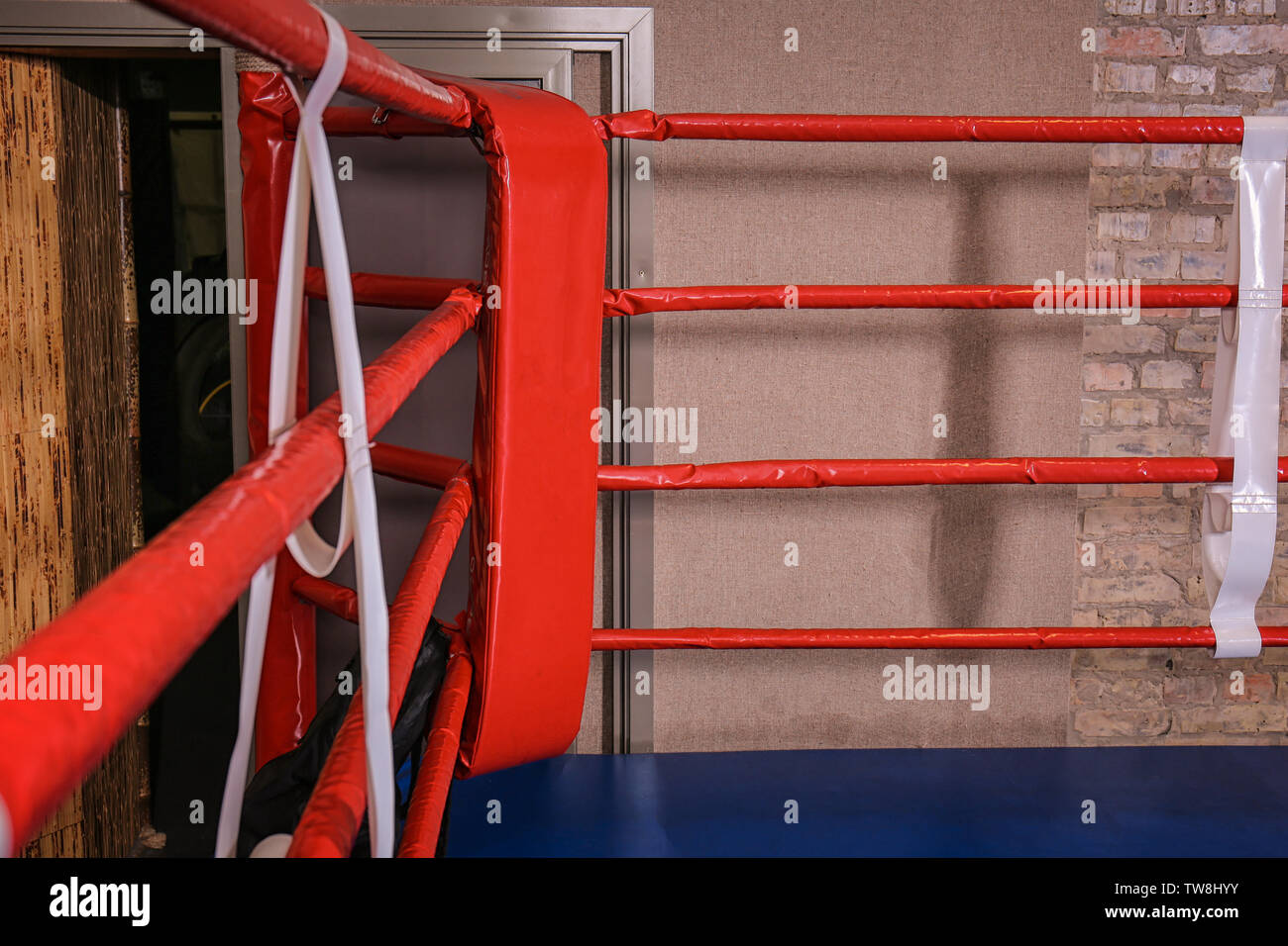 Red corner of boxing ring, closeup Stock Photo - Alamy