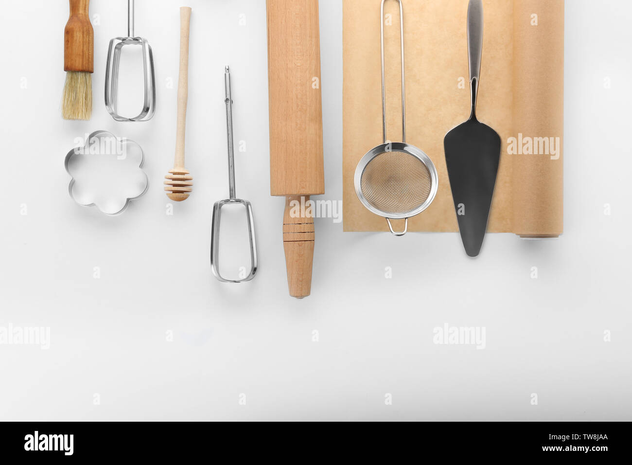Kitchen utensils for pastries on white background Stock Photo - Alamy