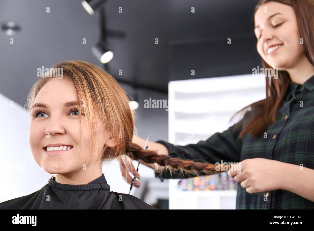 Cutting off the braid hi-res stock photography and images - Alamy