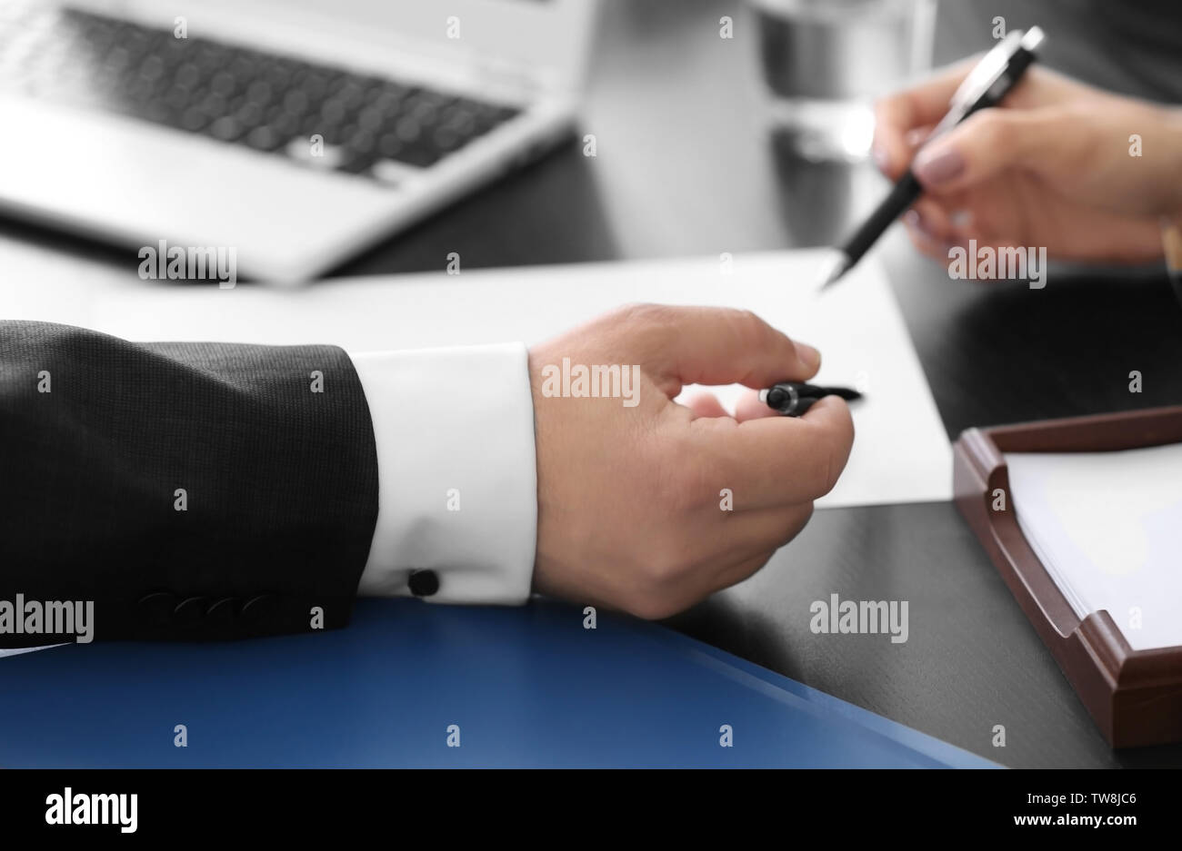 Signing of documents at notary public office Stock Photo - Alamy