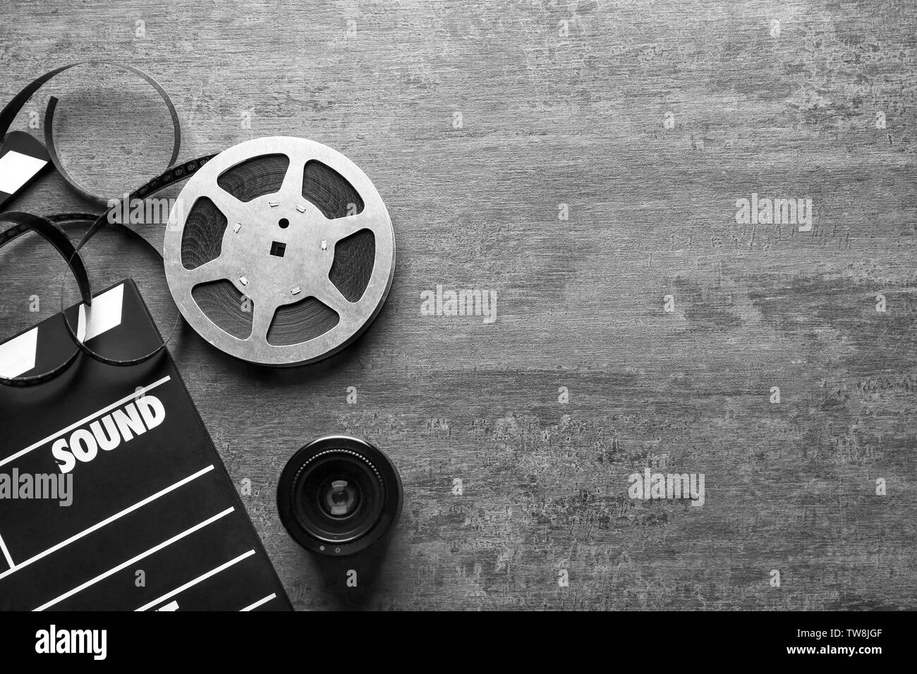 Cinema background with movie clapper Black and White Stock Photos ...