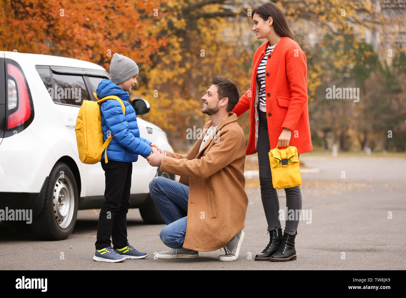 Mother saying goodbye son hi-res stock photography and images - Alamy