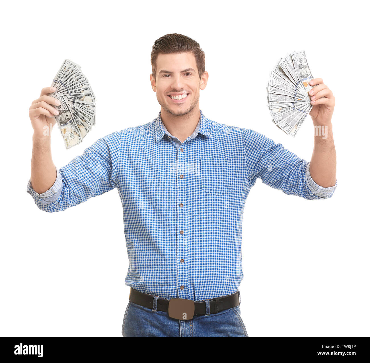 Handsome young man with money on white background Stock Photo - Alamy